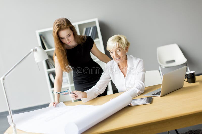 Young Women Working in Office Stock Image - Image of cute, looking ...