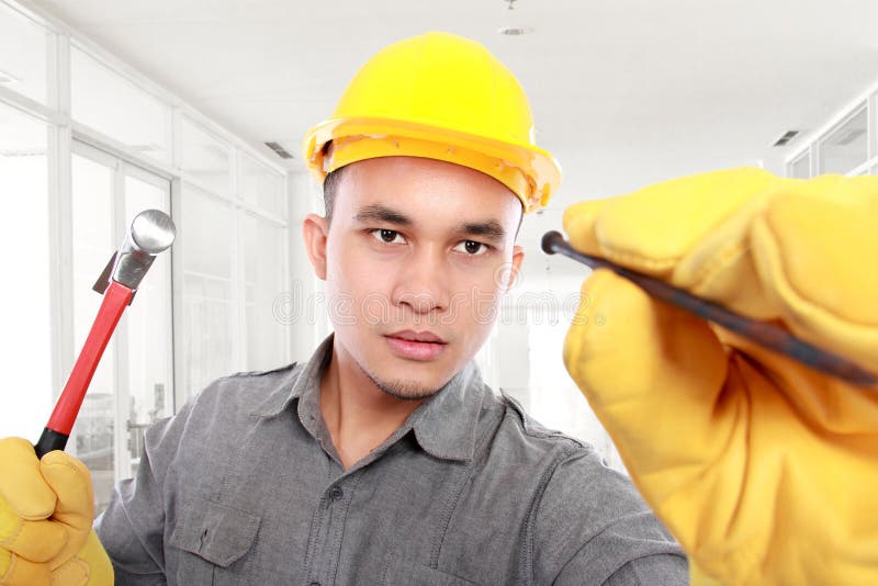 Young worker stock image. Image of helmet, install, attractive - 28244139