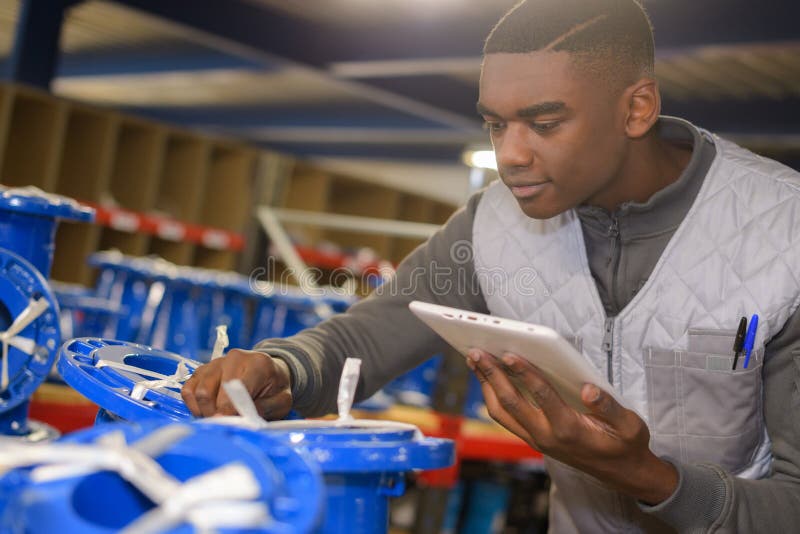 Young Worker Doing Inventory on Warehouse Stock Image - Image of store ...