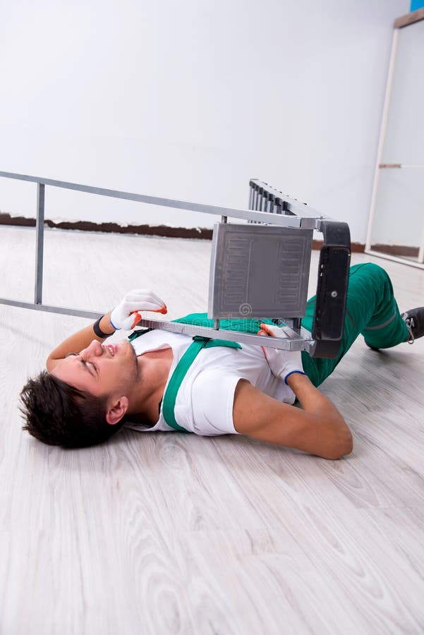 The Young Worker Falling from the Ladder Stock Photo - Image of hardhat ...