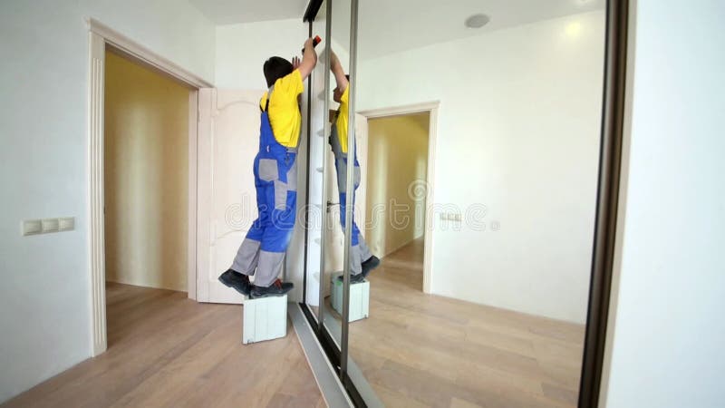 Young Worker Fixes Side Guide Profile of Sliding Stock Footage - Video ...