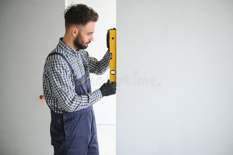 Young Worker Making Repair in Room Stock Photo - Image of occupation ...
