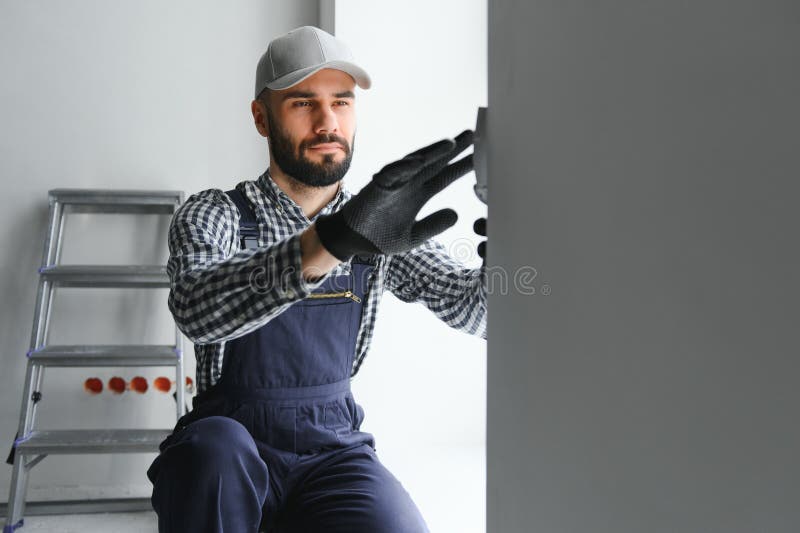 Young Worker Making Repair in Room Stock Image - Image of contractor ...