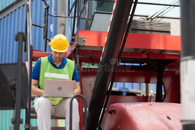 Young Worker Man Working with Computer at Logistic Import and Export ...
