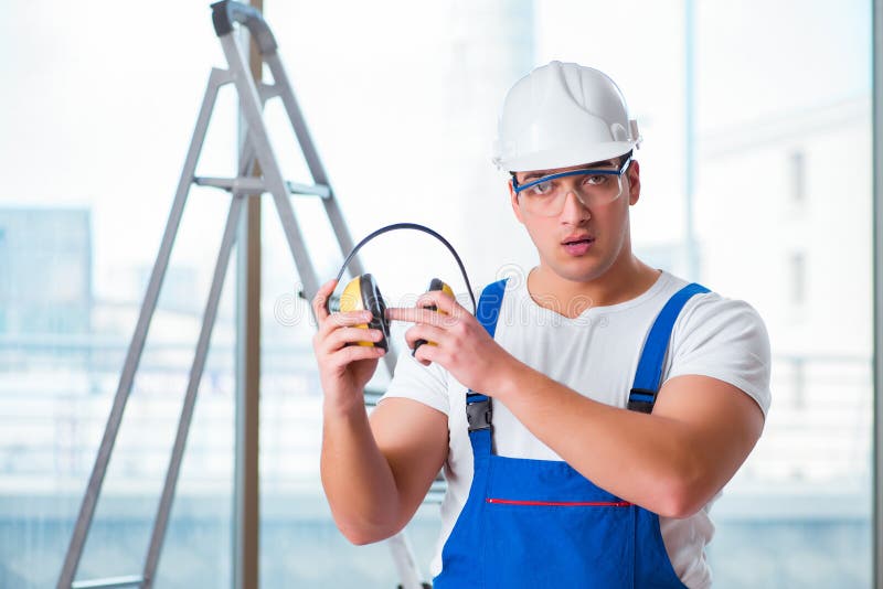 The Young Worker with Noise Cancelling Headphones Stock Photo - Image ...