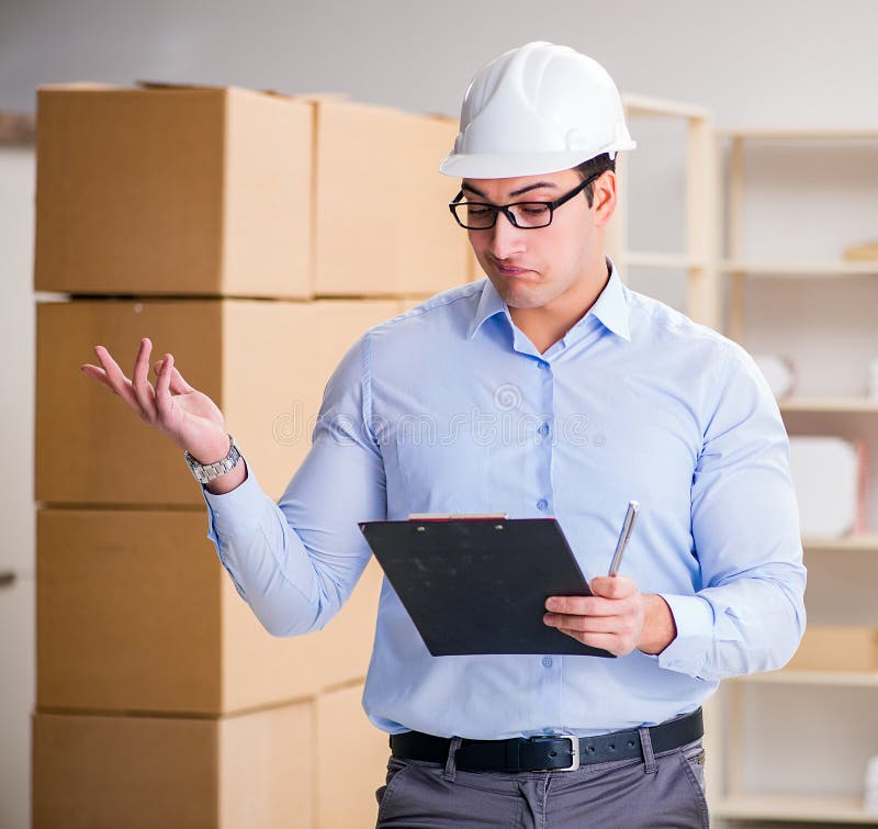 Young Worker in the Postal Office Dealing with Parcels Stock Photo ...