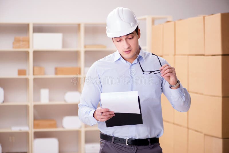 The Young Worker in the Postal Office Dealing with Parcels Stock Image ...
