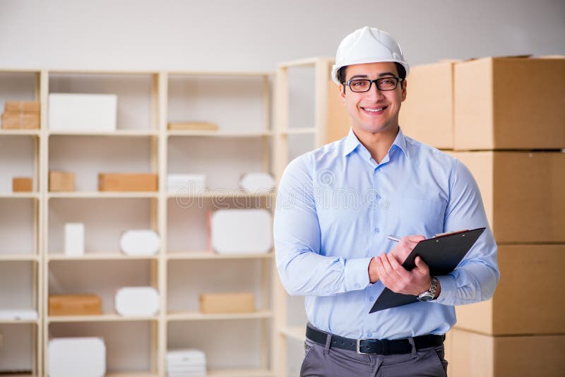 The Young Worker in the Postal Office Dealing with Parcels Stock Image ...