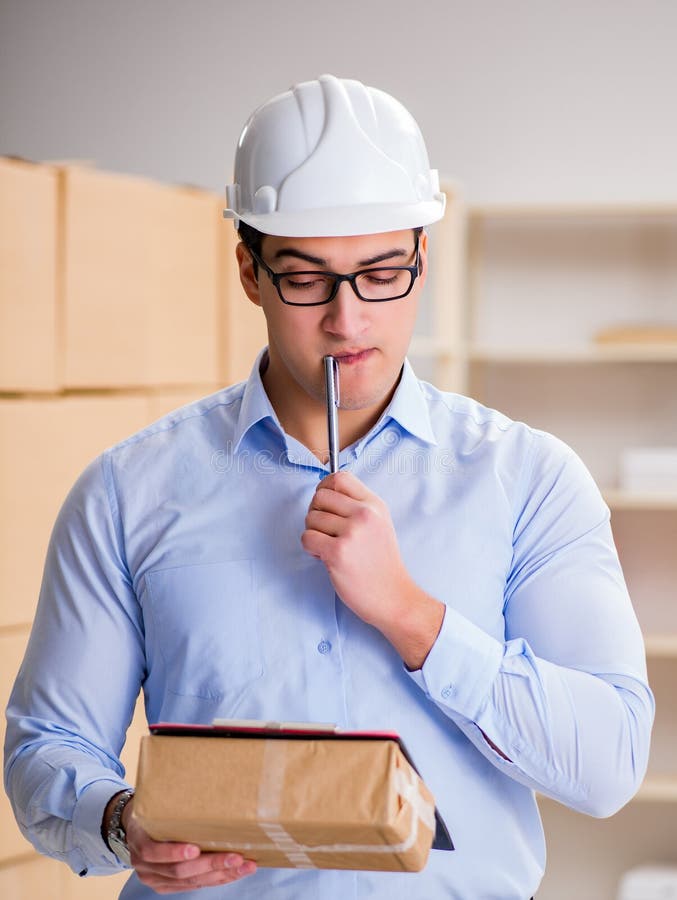 Young Worker in the Postal Office Dealing with Parcels Stock Image ...