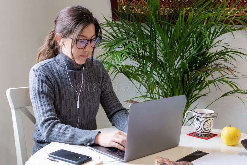 Young Woman Remotely Working on the Computer in His Home Office Stock ...