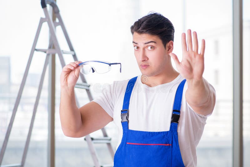 The Young Worker with Safety Goggles Stock Photo - Image of protecting ...