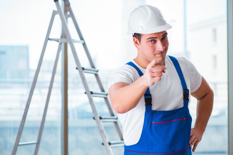 The Young Worker with Safety Helmet Hardhat Stock Photo - Image of ...