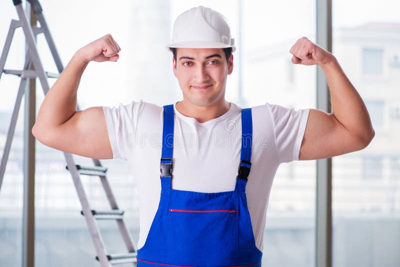 The Young Worker with Safety Helmet Hardhat Stock Photo - Image of ...