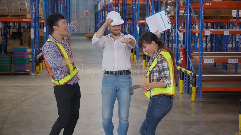 Young Worker and Supervisor Dancing Together while Success or Victory ...
