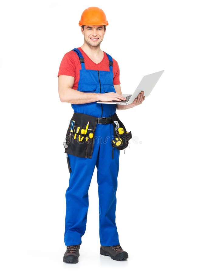 Young Worker with Tools Holds the Laptop Stock Image - Image of ...