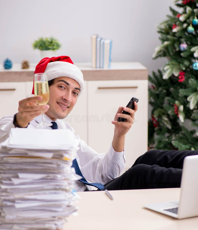 Young Worker Working in Office on Christmas Shift Stock Image - Image ...
