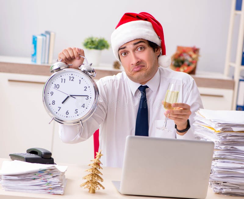 Young Worker Working in Office on Christmas Shift Stock Photo - Image ...