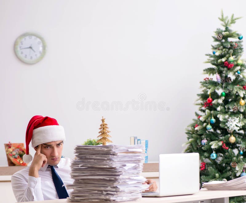 Young Worker Working in Office on Christmas Shift Stock Photo - Image ...