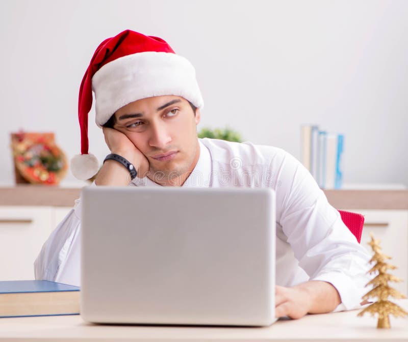 Young Worker Working in Office on Christmas Shift Stock Photo - Image ...