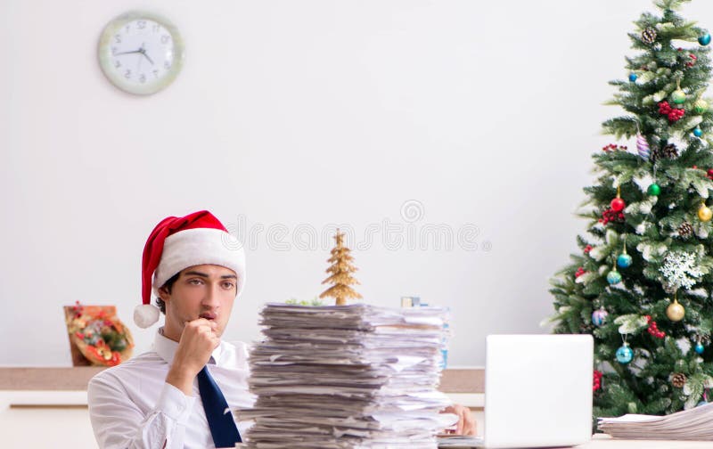 Young Worker Working in Office on Christmas Shift Stock Image - Image ...