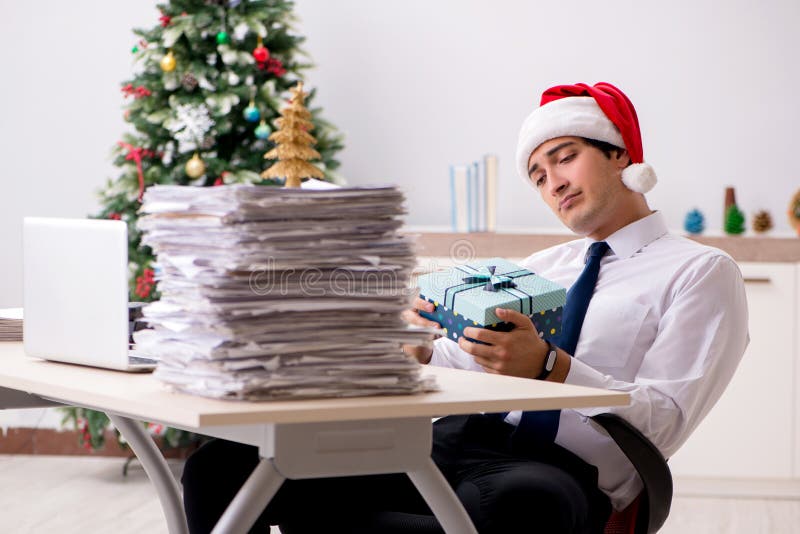 The Young Worker Working in Office on Christmas Shift Stock Image ...