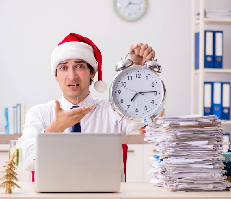 Young Worker Working in Office on Christmas Shift Stock Photo - Image ...