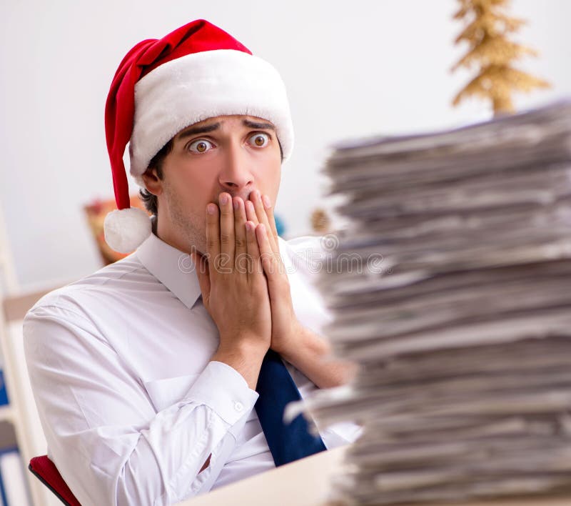 Young Worker Working in Office on Christmas Shift Stock Photo - Image ...