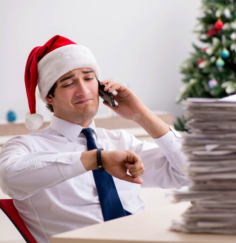 Young Worker Working in Office on Christmas Shift Stock Photo - Image ...