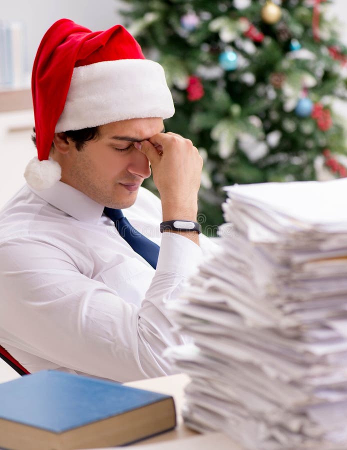 Young Worker Working in Office on Christmas Shift Stock Photo - Image ...