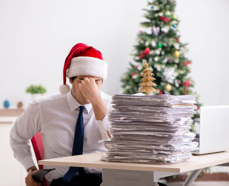 Young Worker Working in Office on Christmas Shift Stock Photo - Image ...