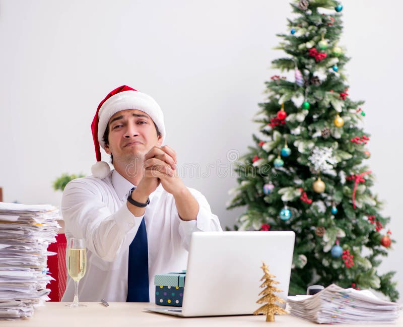 Young Worker Working in Office on Christmas Shift Stock Photo - Image ...
