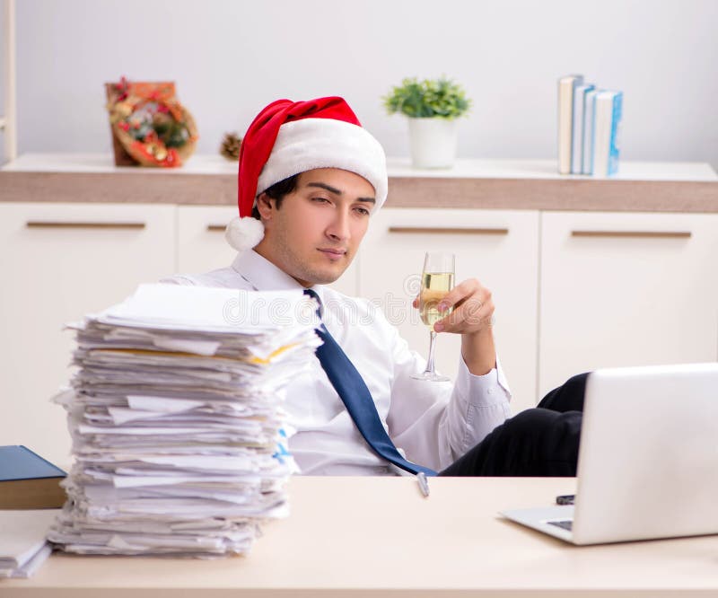 Young Worker Working in Office on Christmas Shift Stock Photo - Image ...