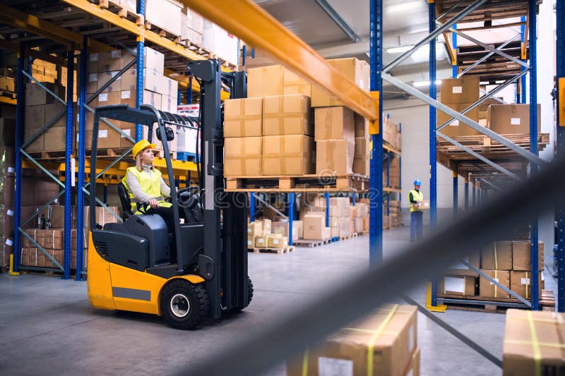 Forklift Driver at Warehouse of Forwarding Stock Photo - Image of ...