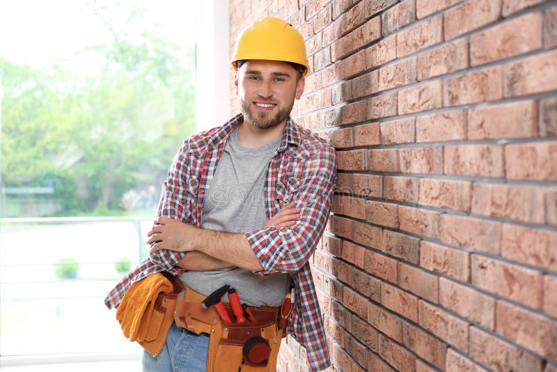 Young Working Man in Hardhat Stock Image - Image of instrument, male ...