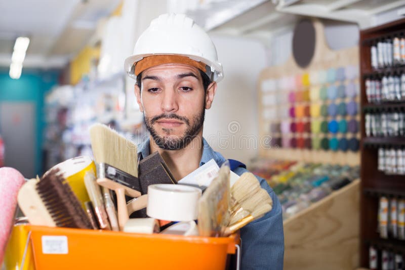 Young Workman Holding Basket with Picked Tools Stock Photo - Image of ...