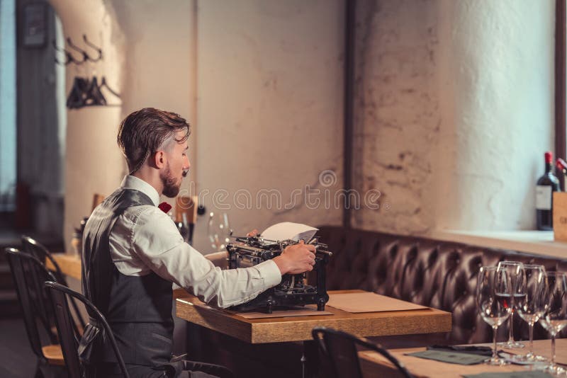 Young Writer Typing on a Retro Typewriter Stock Image - Image of ...