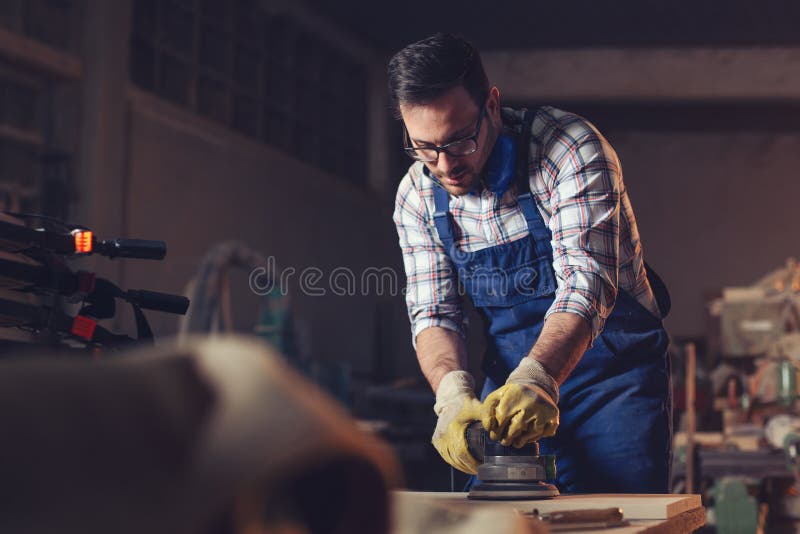 Carpenter Finishing Wood in Carpentry Workshop Stock Image - Image of ...