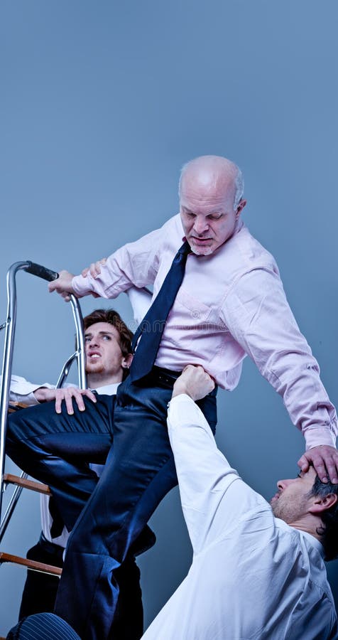 Younger Workers Want To Cut Off the Older Stock Image - Image of ...