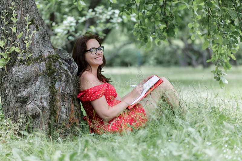 143 Woman Writing Under Tree Stock Photos - Free & Royalty-Free Stock ...