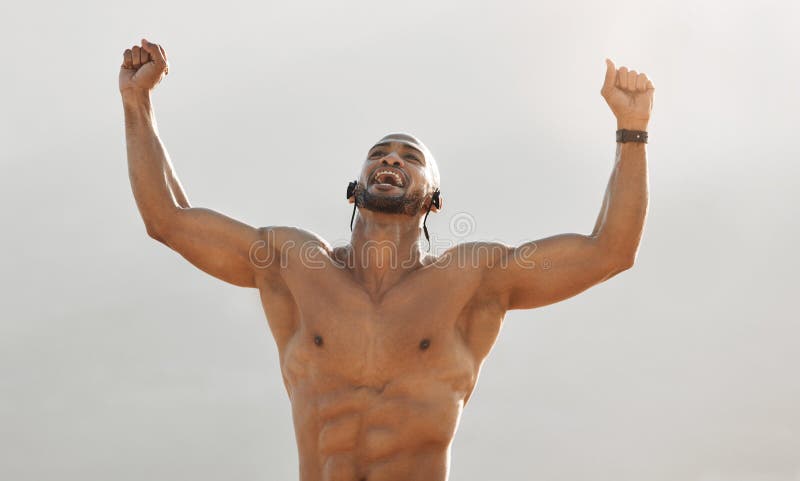 Your Body is the Temple. a Young Man Celebrating on the Beach. Stock ...