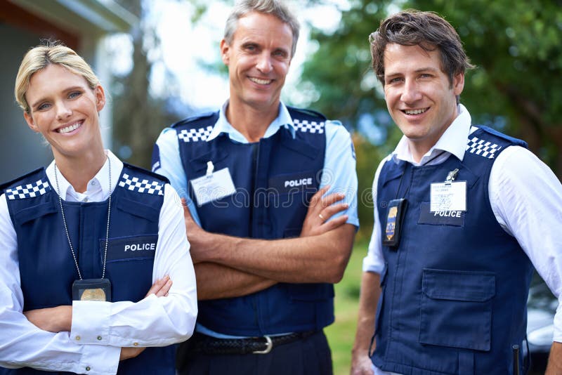 Your Friendly Local Force. Three Smiling Members of the Police Force ...