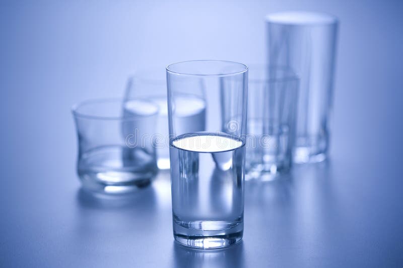 Is Your Glass Half Empty or Half Full? Stock Photo - Image of glasses ...