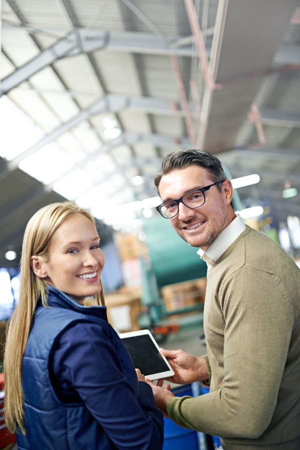 Your Goods are in Great Hands. a Two Coworkers Managing a Warehouse ...