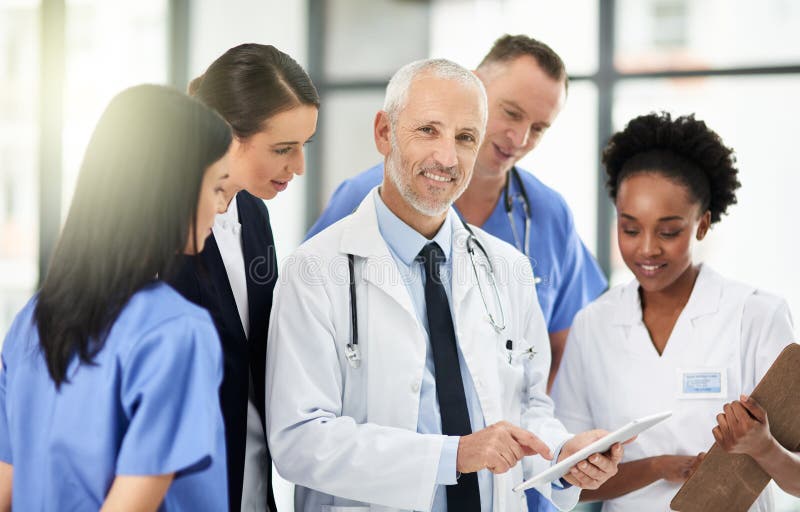 Your Health is of the Utmost Importance. Doctors in a Hospital. Stock ... Your Health is of the Utmost Importance. Doctors in a Hospital. Stock ...