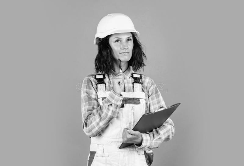 Your One Stop Source. Mechanic Girl in Protective Hardhat. Building and ...