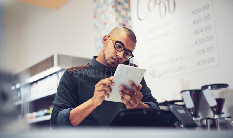 Your Online Order is Ready for Pickup...a Man Talking on His Cellphone ...