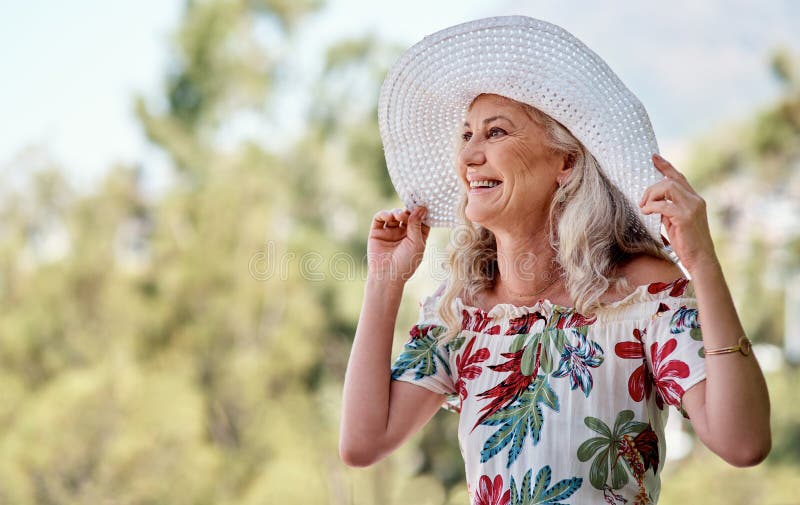 When Your Retirement Starts In The Summer An Attractive Senior Woman