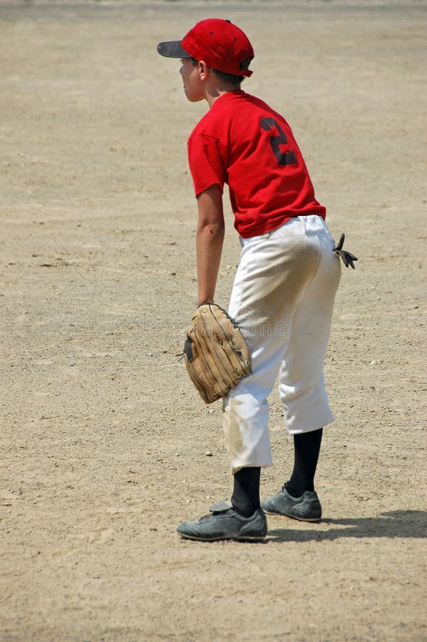 Boy Pitching in Youth Baseball Game Stock Photo - Image of pitcher ...