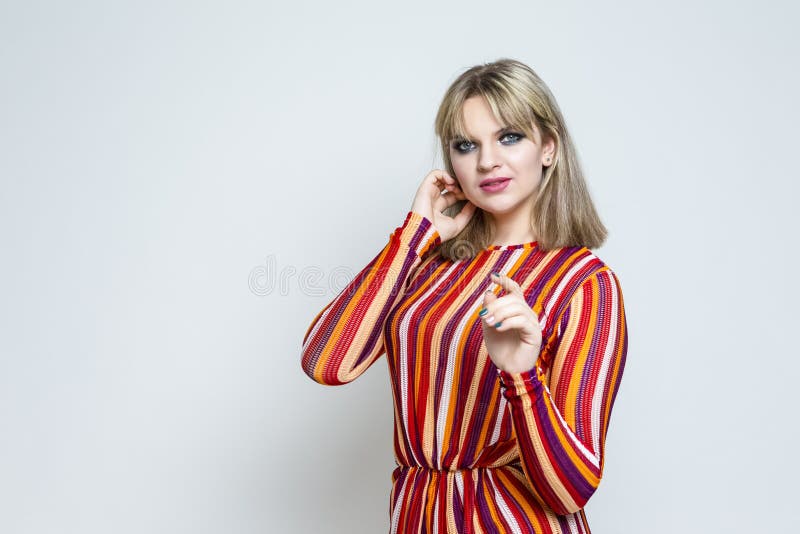 Youth Concepts Portrait Of Happy Caucasian Blond Girl In Vivid Striped