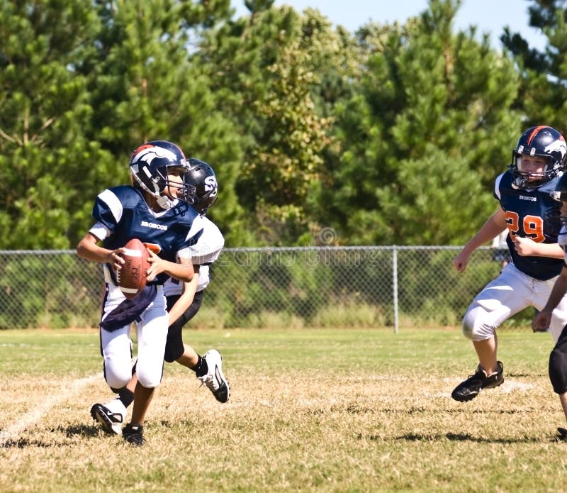 Youth Football Player Blocking Editorial Stock Photo - Image of help ...